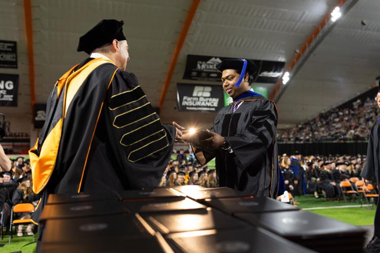 Photos of Idaho State University's commencement ceremonies at ICCU Dome | Freeaccess ...