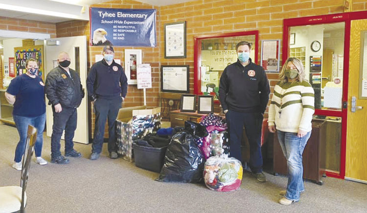 North Bannock firefighters donate 200 coats to kids in need | Local ...
