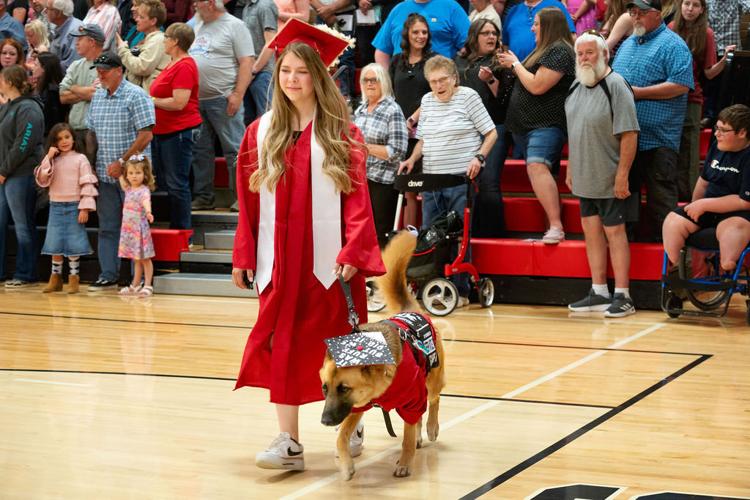 Local teen walks across graduation stage two years early with service ...