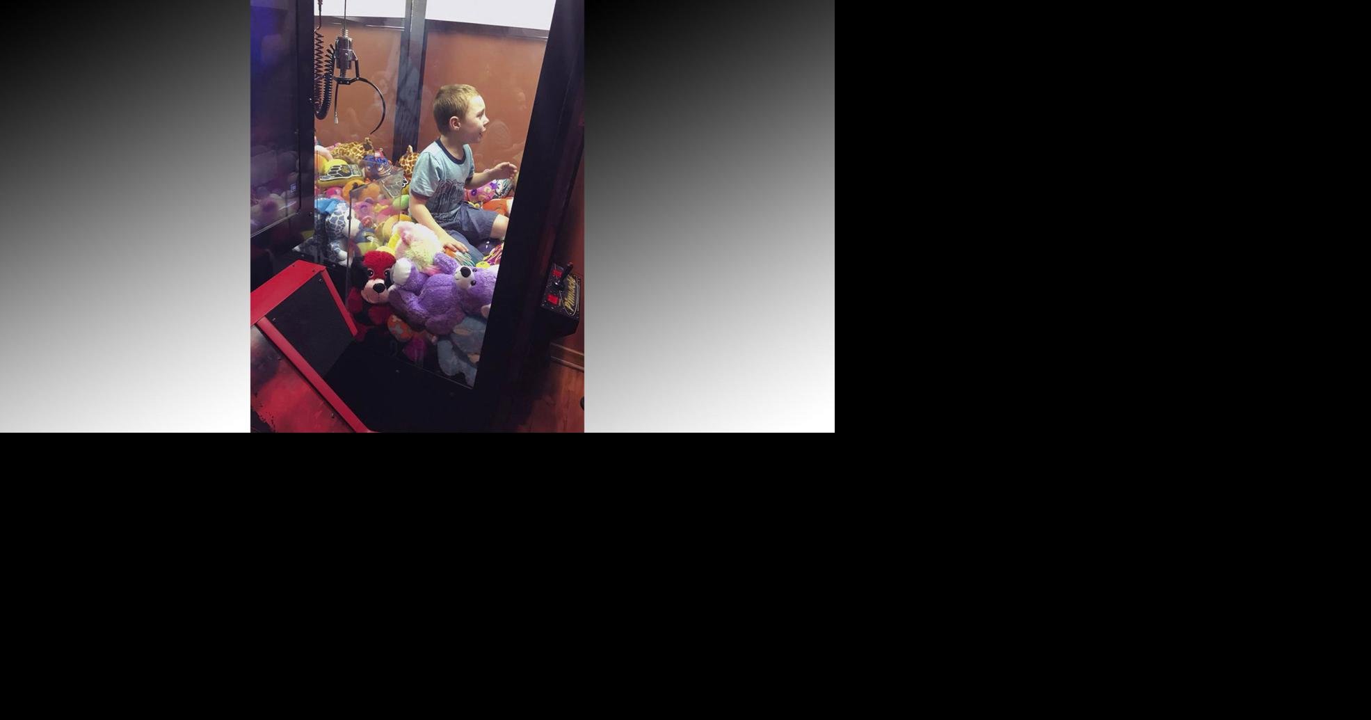 Give me a toy — Boy gets trapped in vending machine | Local ...