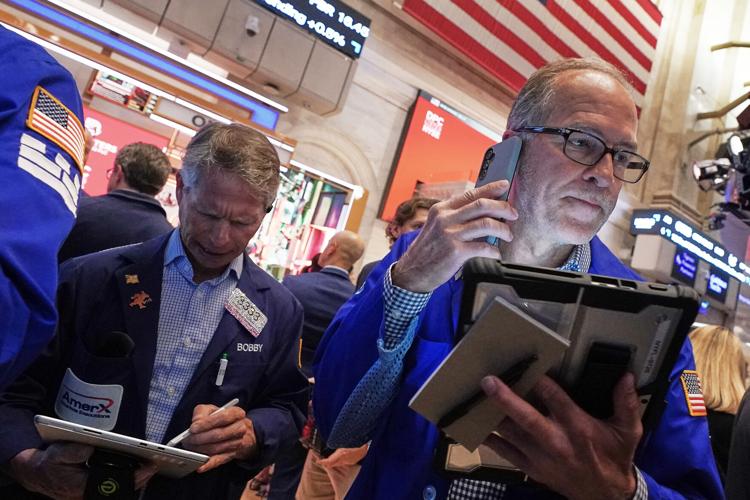 Most of Wall Street rises, but sinking AI stocks send it lower for the ...