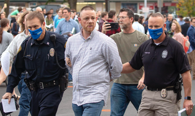 Federal judge orders Idaho city to reach settlement with mask ...