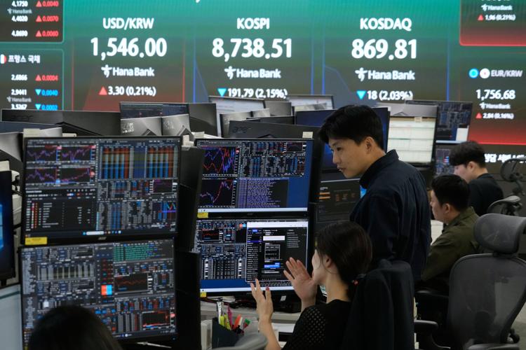 Most of Wall Street rises, but sinking AI stocks send it lower for the ...