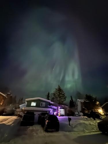 Aurora lights up Alaska skies with stunning green and red display ...