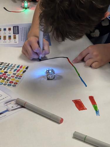 Youth enjoy learning with Ozobots at local elementary school ...