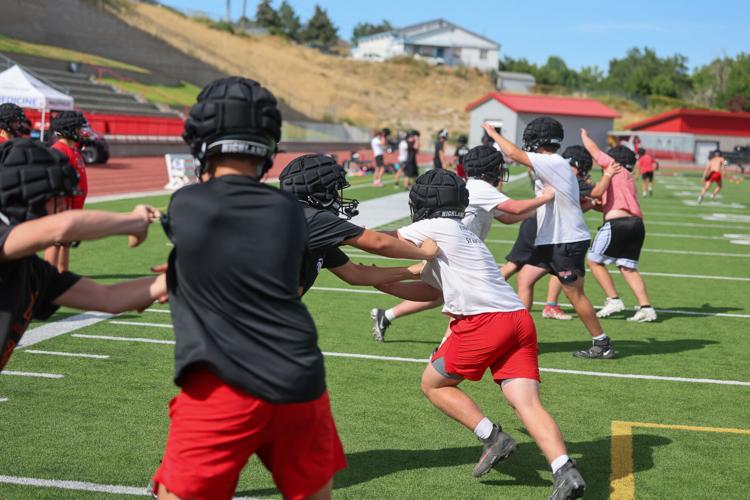 Photos of Highland High School football practice | High School ...