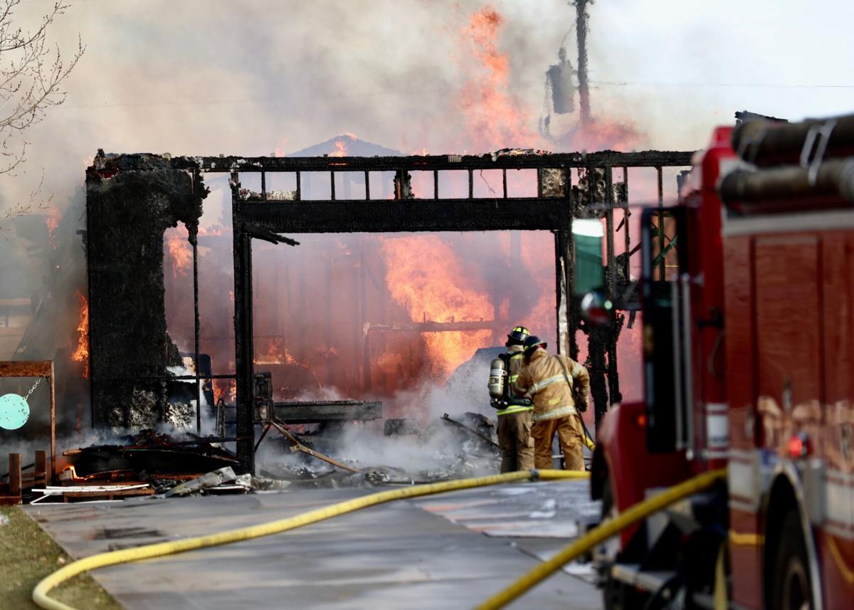 Firefighters from multiple departments battle garage fire north of ...