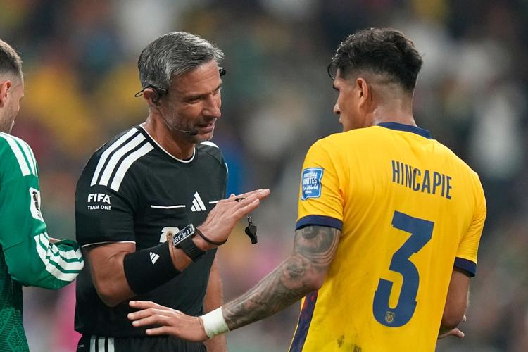 Why are World Cup refs giving red cards to players covering their ...