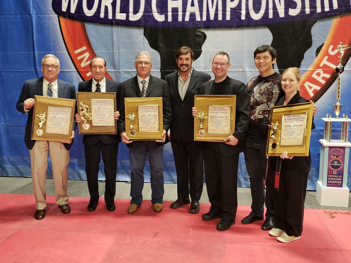 Martial arts school teaching self-confidence while graduating black ...