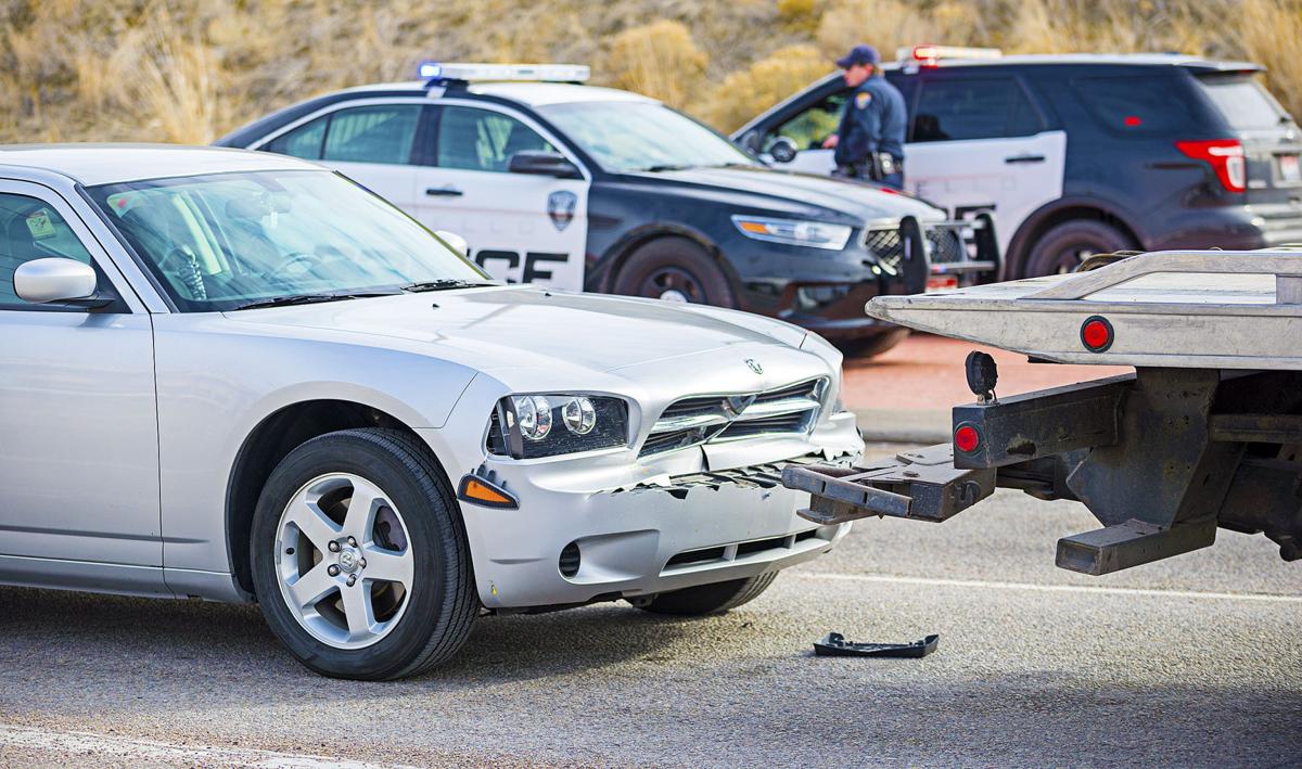 Motorist, Pocatello police officer injured after tow truck strikes ...