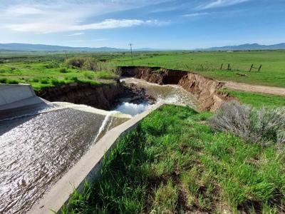 Conditions improve at damaged Chesterfield Reservoir spillway but flood warnings remain in ...