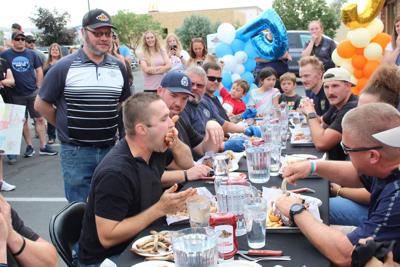 Local first responders pig out for charity during rib eating ...