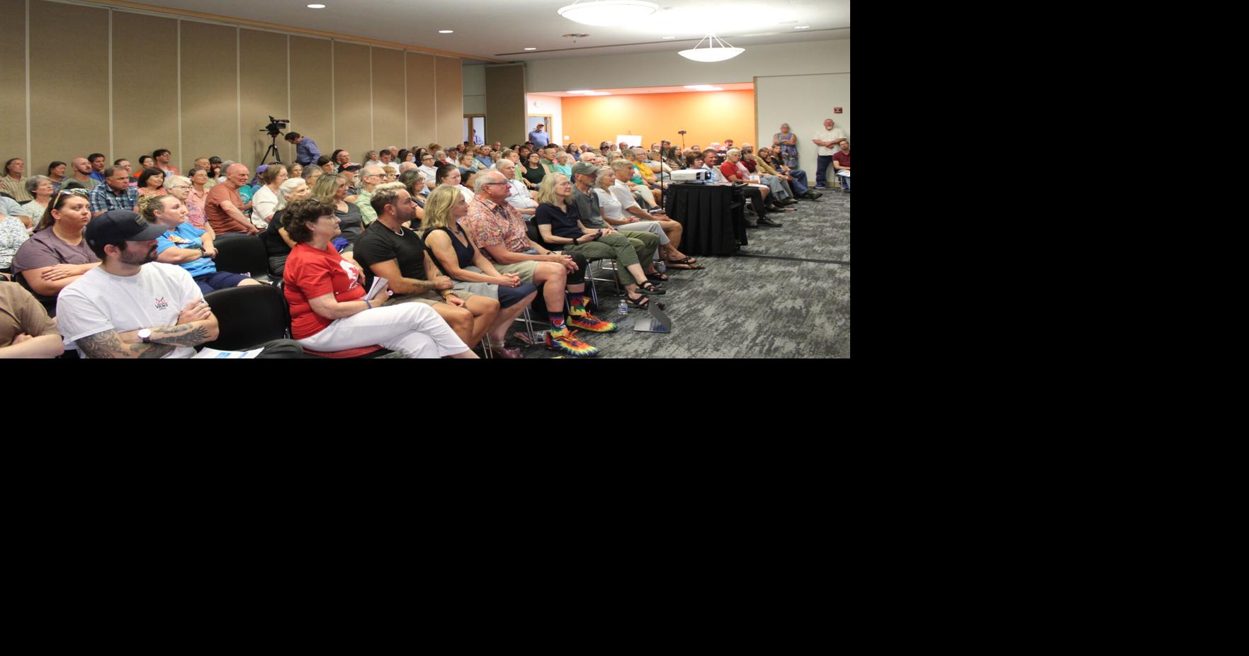 'Not a dollar more': Community speaks out against voucher programs at ...