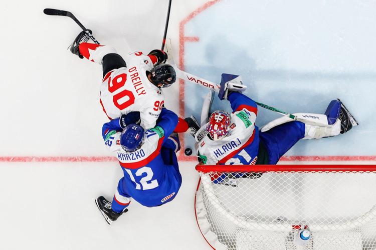 Canada scores 4 in the final period to beat Slovakia 5-1 at ice hockey ...