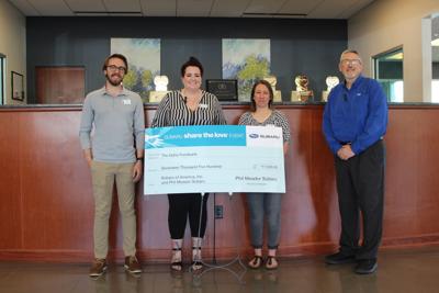 Phil Meador Subaru presents $17.5K check to the Idaho Food Bank | Local ...
