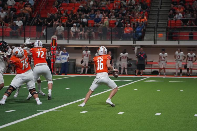 Photos of ISU's 50-10 win against Western Oregon at the ICCU Dome in ...