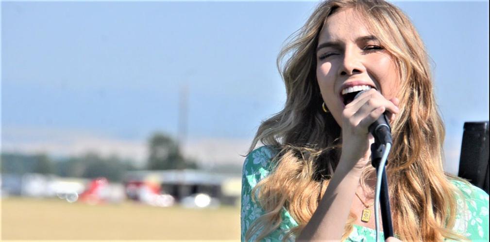 American Idol contestant Paige Anne entertains during Wendy's Grand ...