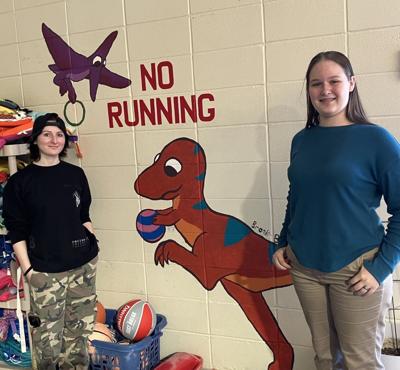 Local artists paint mural with a message at Forsyth Swimming Pool ...