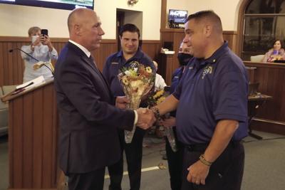 EMS officers who saved police chief honored by town | News ...