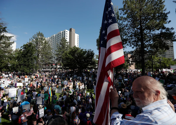 Spokane protests the detention of two legal immigrants and President ...