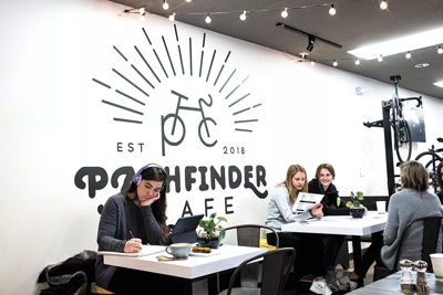 The newly opened Pathfinder Cafe shares a home with a South Hill bike ...