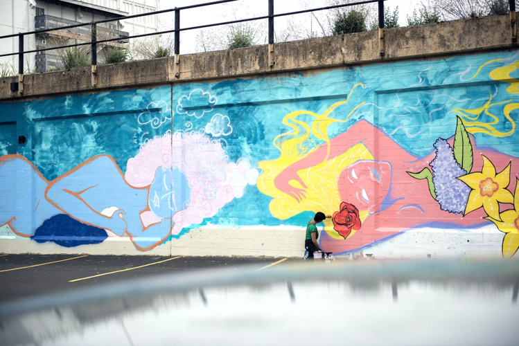 Two local artists talk about their downtown mural in progress for ...