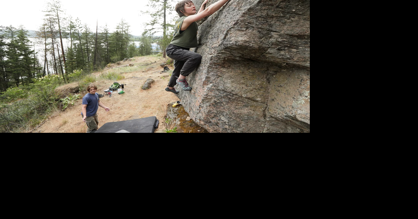 An indoor rock climber tackles Tubbs Hill bouldering in Coeur d’Alene ...