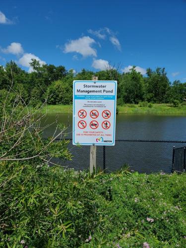 What’s going on here? New signs around Milton stormwater ponds