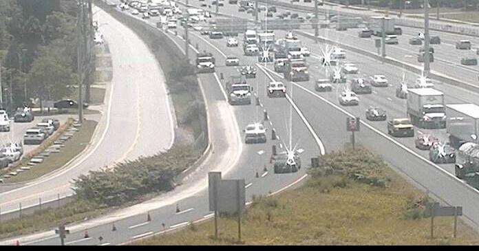 Spill on QEW in Oakville causing lane closures and traffic issues