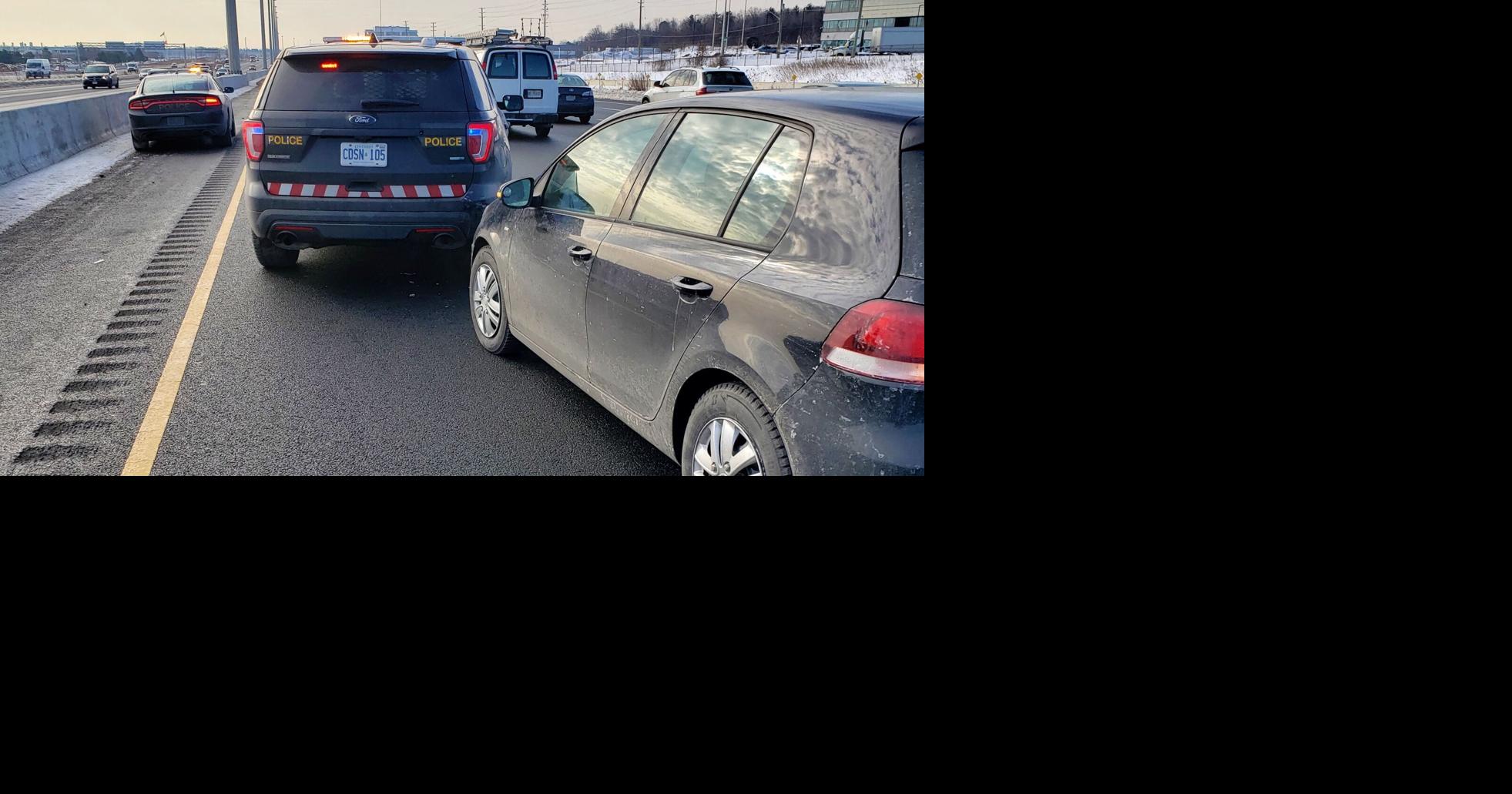 Car collides with OPP vehicle in crash on QEW in Oakville