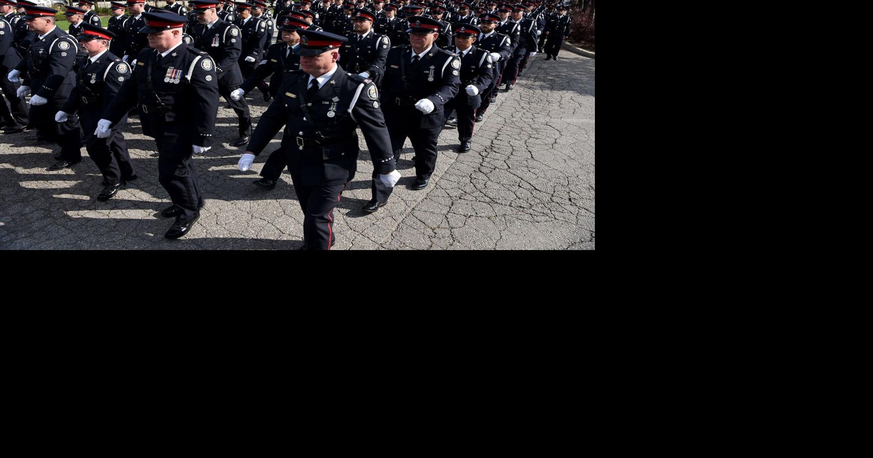 Thousands of officers gather for funeral of police officer