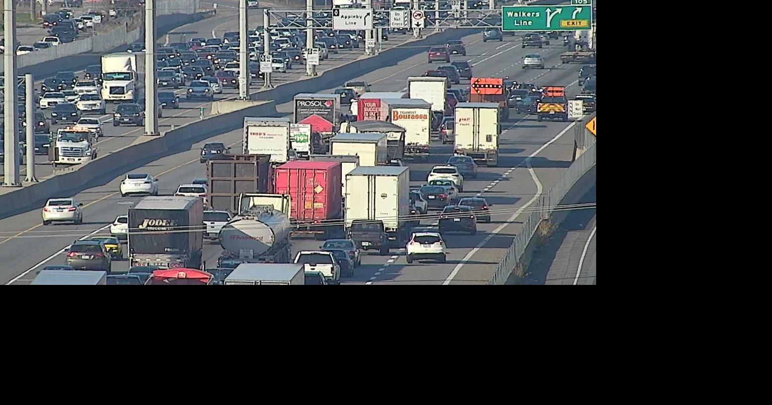 Crash closes multiple lanes on QEW in Burlington
