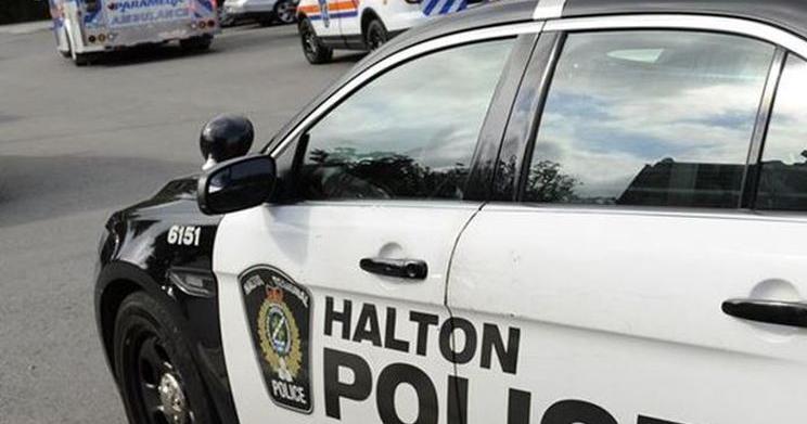 Unconscious driver rescued from burning car by Halton police
