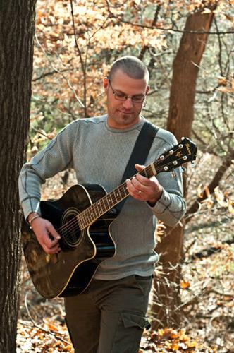 Former street performer's music influenced by country, rock