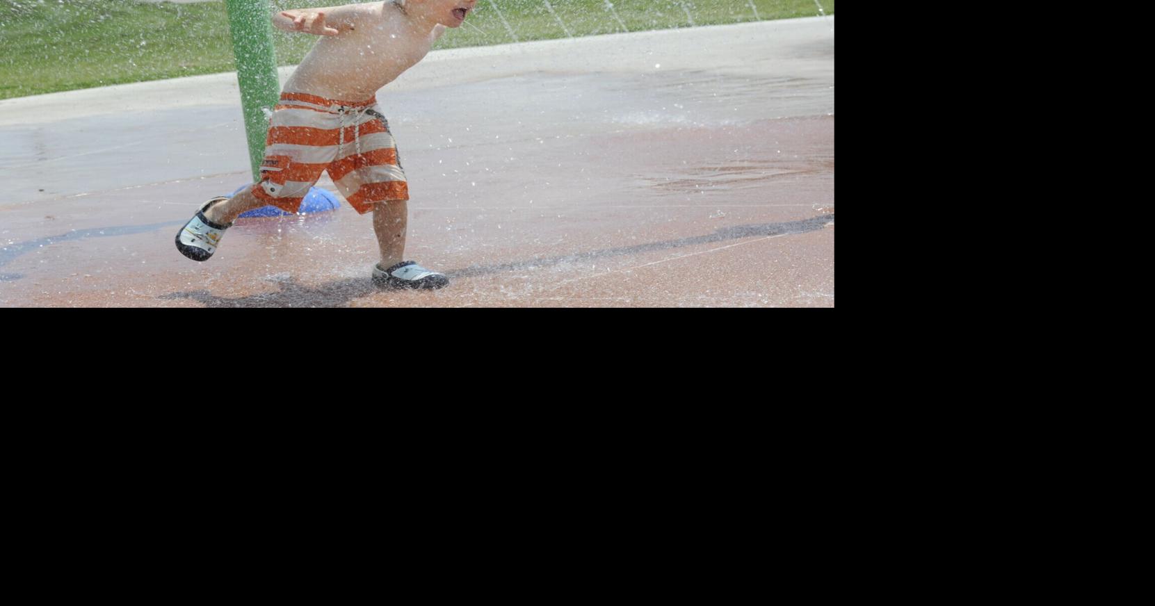 Families beat the heat at Milton splash pads
