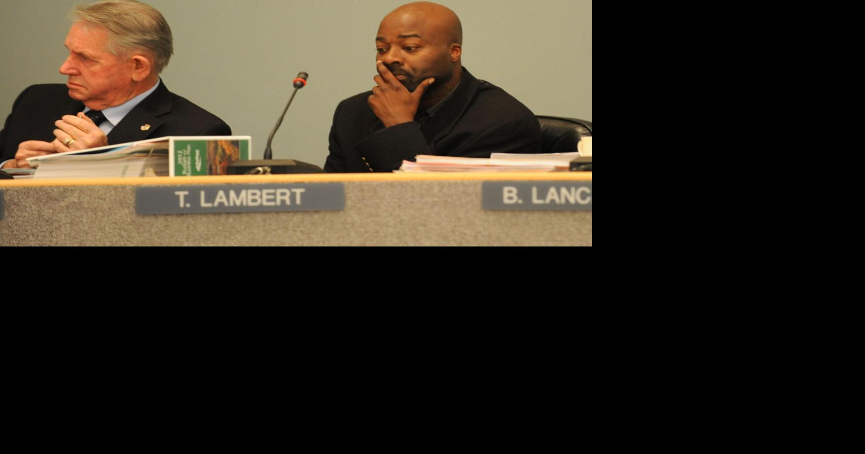 Lambert says he has no plans to step down as councillor