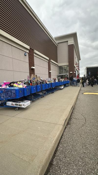 Burlington Dad’s buy $32,000 in toys for donation
