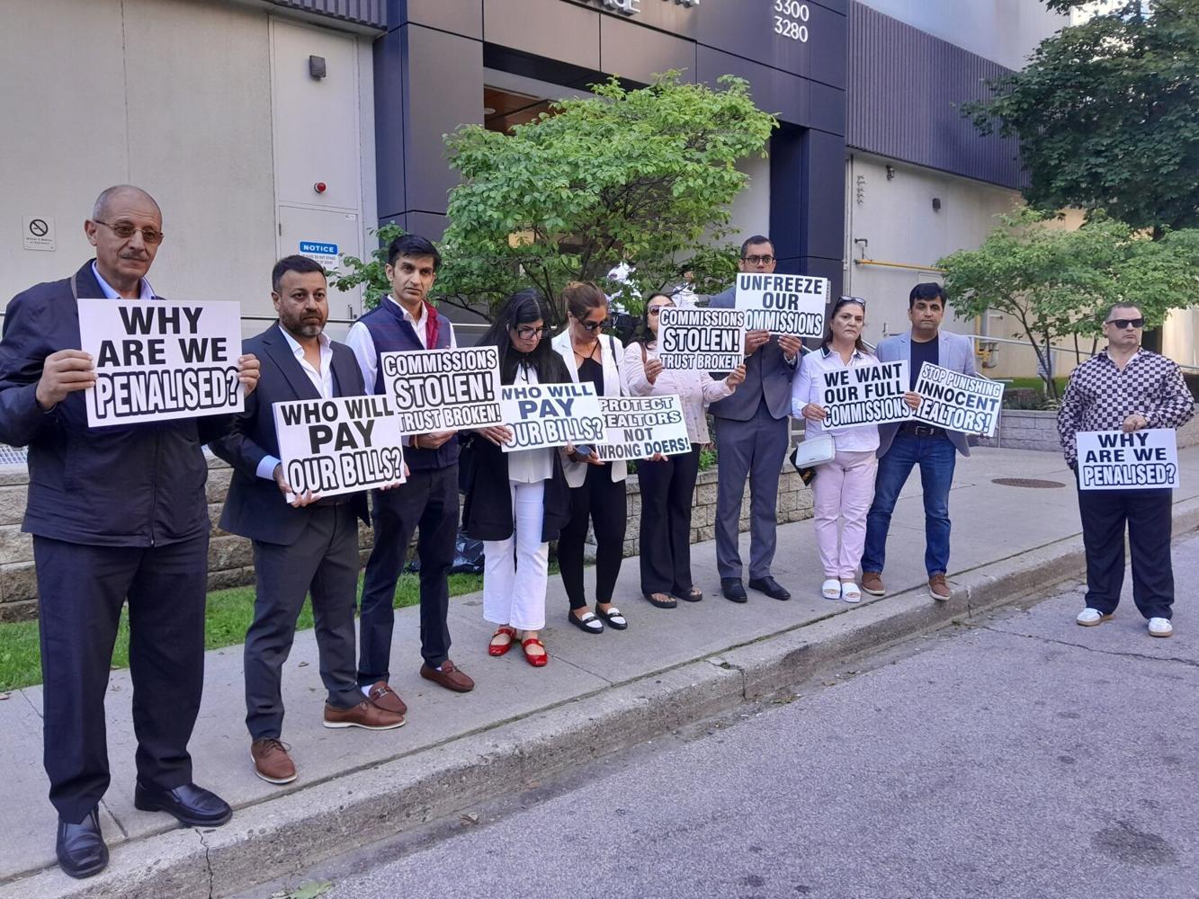Former iPro Realty agents stage protest outside RECO office