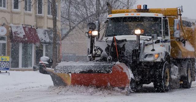 Snow plows moving across Burlington and Oakville