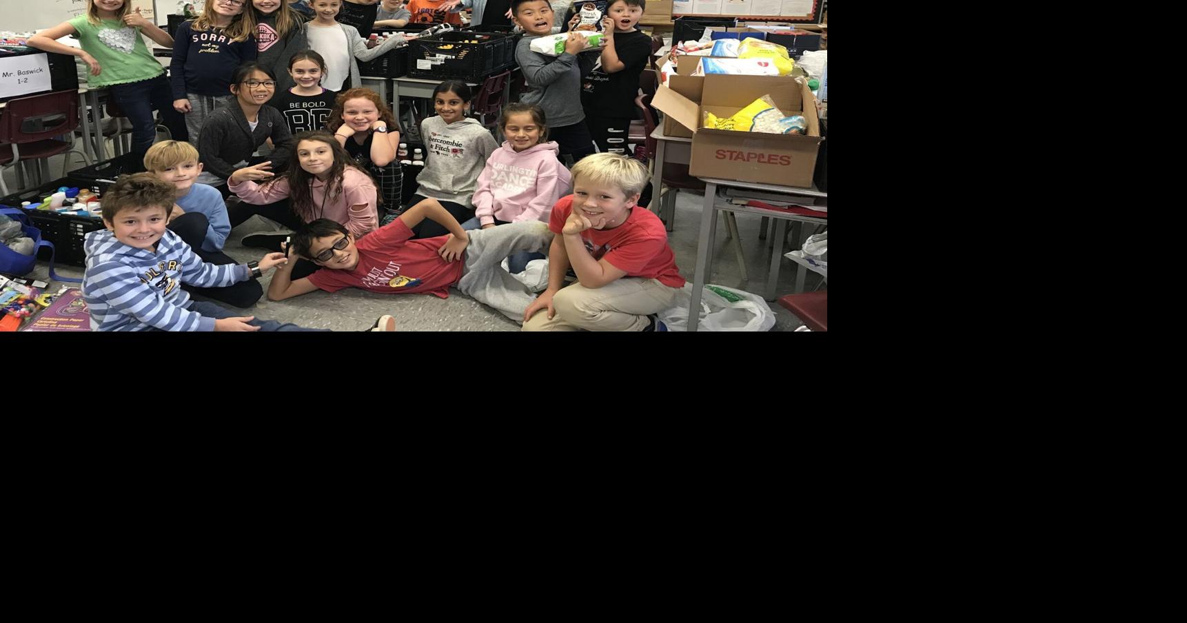 Burlington's John T. Tuck students support Friday Night Community