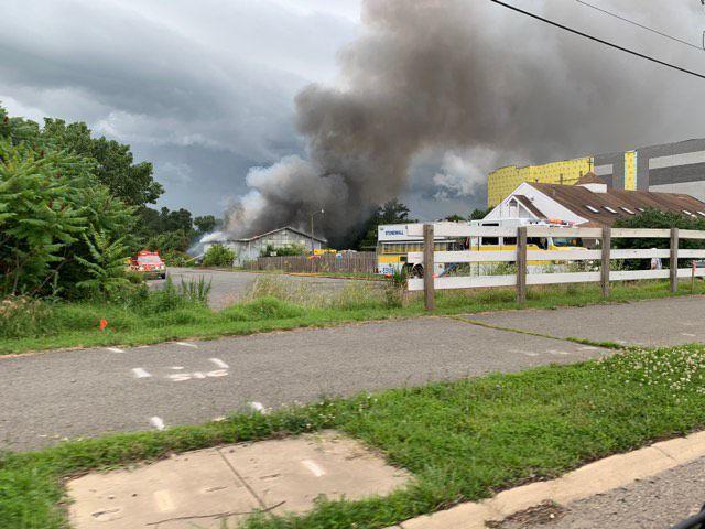UPDATED: Two-alarm fire engulfs commercial building in Gainesville ...