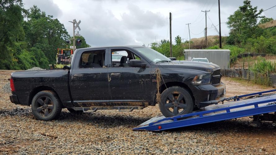 Flooding washes away cars, traps customers and staff at Tim's ...
