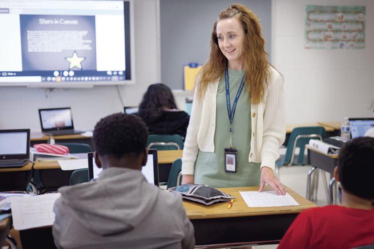 Driven to teach: Haymarket woman pulls double duty for her students ...