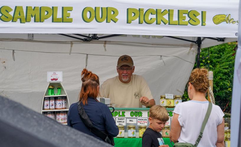 IN PHOTOS: A rainy scene at annual Occoquan RiverFest and Craft Show ...