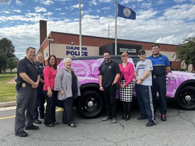 Pink Police: Town police car adorned with breast cancer support ...