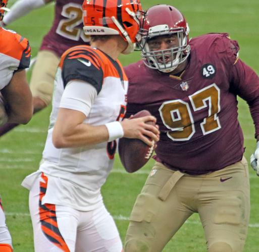 PHOTOS: Stonewall Jackson graduate Tim Settle helps Washington's ...