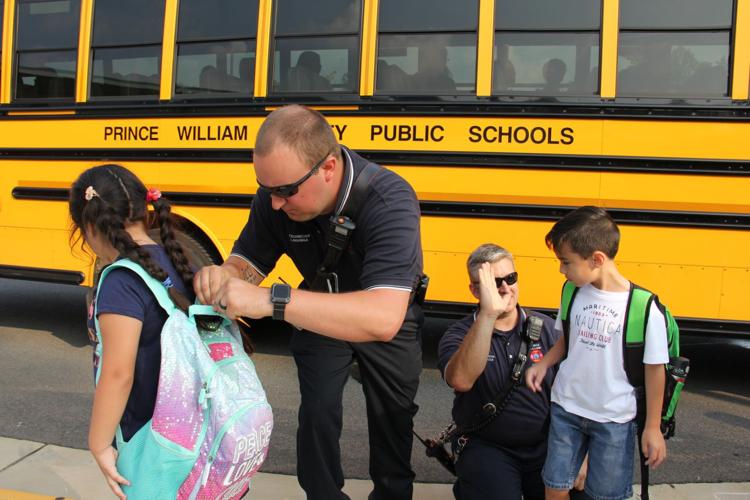 Firefighters welcome students at Kyle Wilson Elementary | Prince ...
