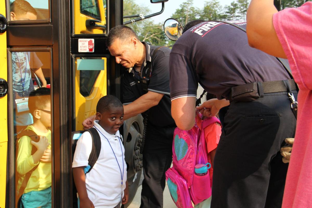 Firefighters welcome students at Kyle Wilson Elementary | Prince ...