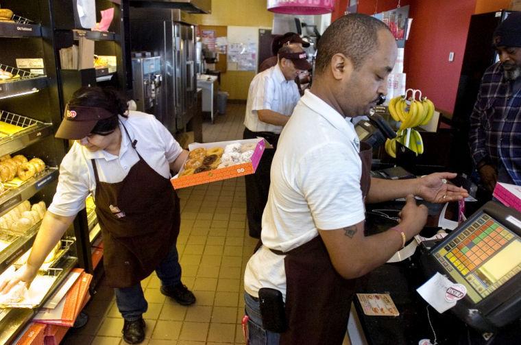 Workers At Dunkin Donuts