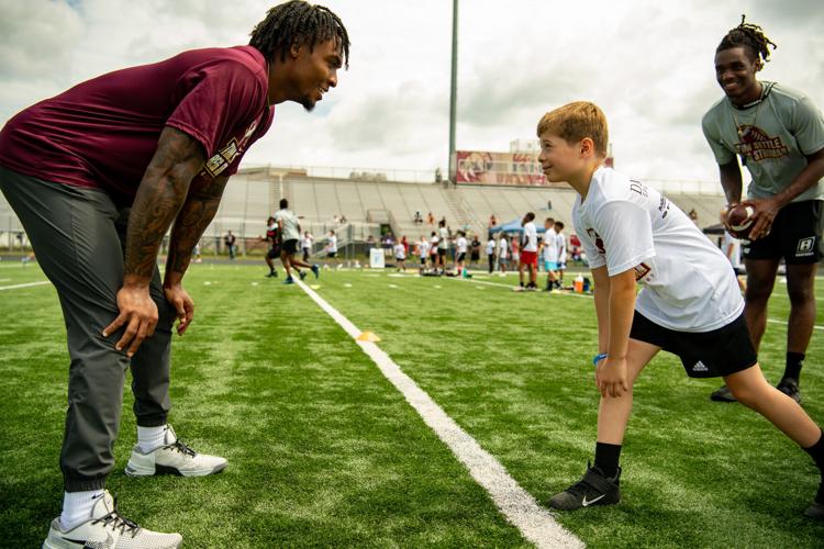 PHOTOS: Greg Stroman, Tim Settle hosted football camp at Unity Reed ...